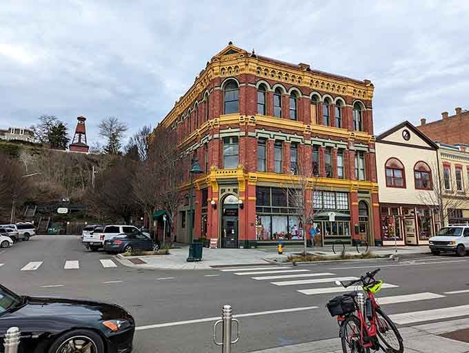 Port Townsend's ornate Victorian corner building stands like a three-story wedding cake decorated with arched windows and golden trim.