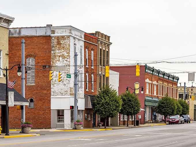 These vintage storefronts wear their age like badges of honor, each weathered brick holding memories of generations past.