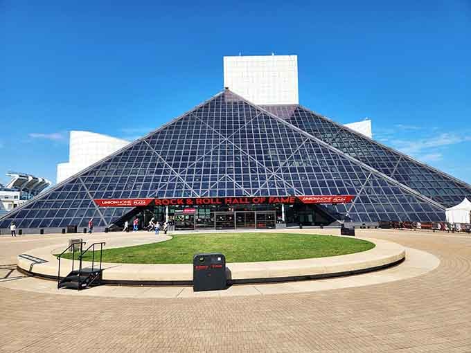 That geometric glass structure catches light and attention, announcing boldly that rock and roll lives here permanently.