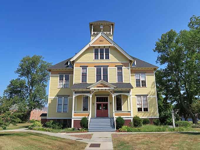 Victorian gingerbread trim adorns this yellow beauty like frosting on a cake, perfectly preserved for future generations.