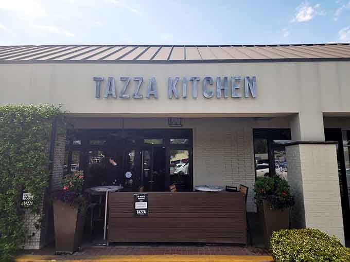 Simple elegance defines this storefront where fresh ingredients and wood-fired cooking create memorable meals in a relaxed shopping plaza setting.