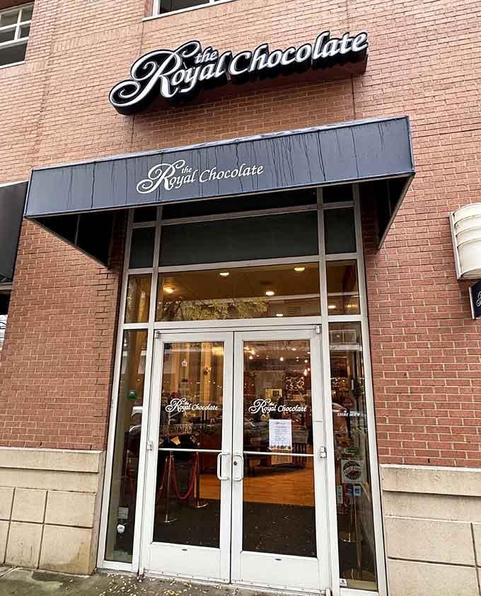 That sleek black awning and pristine entrance promise premium chocolates worthy of their regal name inside.
