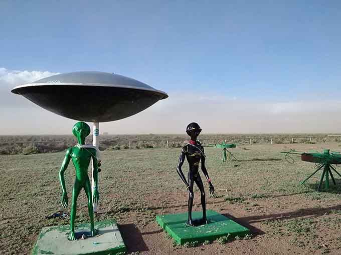 The alien greeters stand ready to welcome believers and skeptics alike to a place where the truth might actually be out there.
