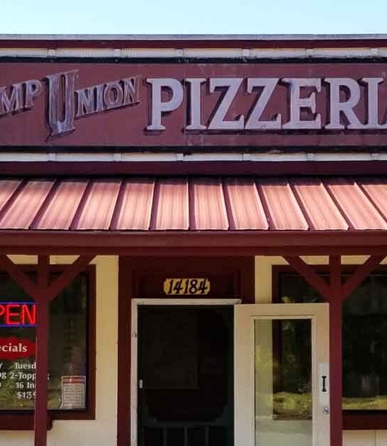 Nothing Can Prepare You For The Giant Pizzas At This Tiny Washington Pizzeria