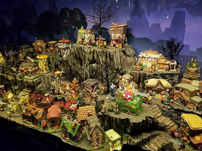 This fantasy village perched on mystical cliffs proves someone spent serious time creating pure miniature magic.