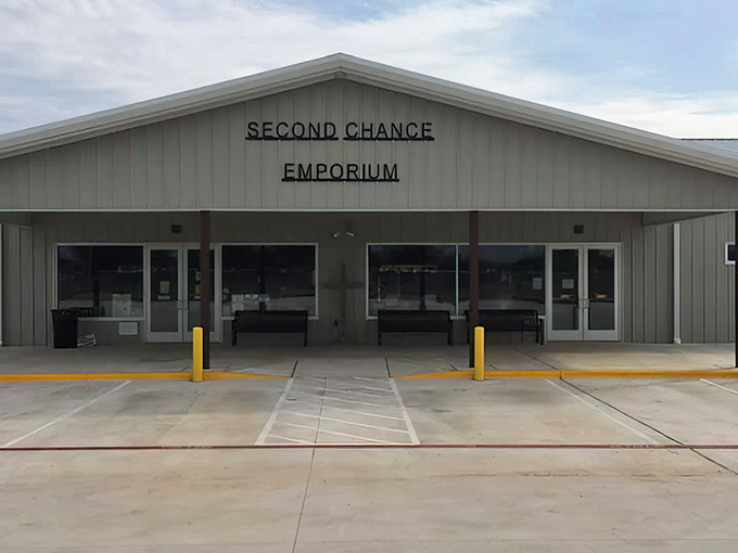 That unassuming warehouse exterior is hiding more bargains than a game show contestant's wildest dreams inside.