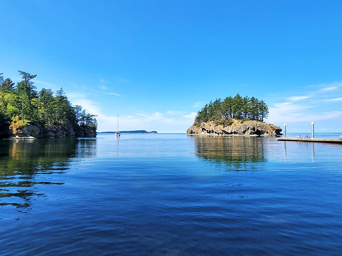 The protected cove at Matia Island offers mirror-like waters and dramatic rocky outcrops that create a boater's paradise in the San Juans.