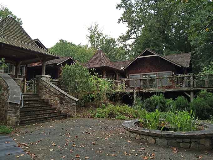 The charming entrance invites you into America's oldest songbird sanctuary, where nature meets architectural whimsy beautifully.