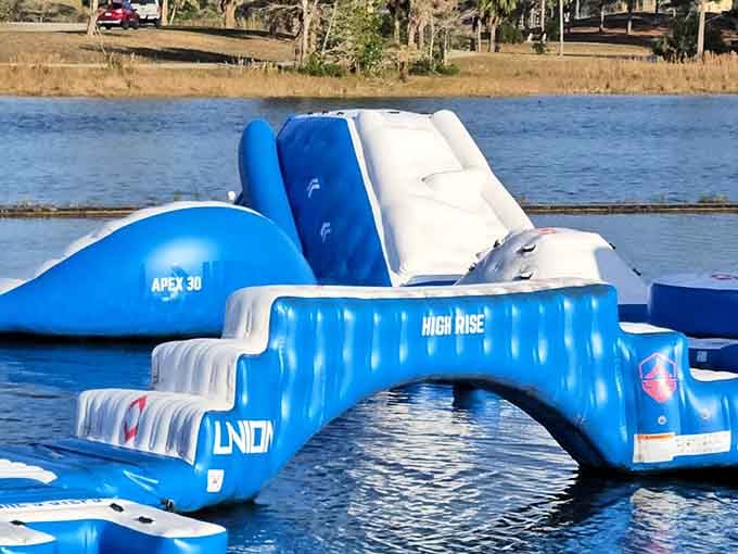 The aqua park awaits with slides, climbs, and countless opportunities to discover gravity still works perfectly fine.