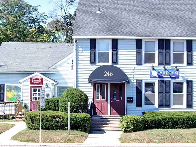 That red door and charming awning hide one of Connecticut's best-kept breakfast secrets in plain sight.