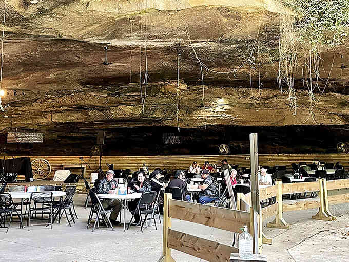 Mother Nature's dining room seats about a hundred guests under striations of limestone that predate your great-great-grandparents by millions of years.