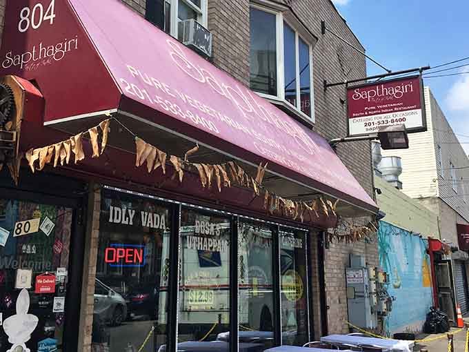 That burgundy awning beckons like a flavor-filled lighthouse guiding hungry souls to vegetarian paradise in Jersey City.
