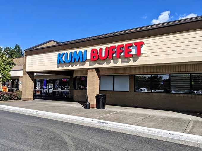 That bold blue and red signage isn't just announcing a restaurant – it's declaring a full-scale flavor invasion.