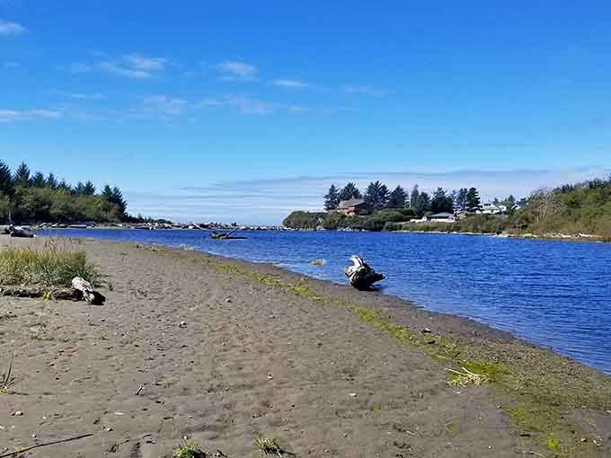 That dark sand and peaceful river meeting the ocean? This is what "getting away from it all" actually looks like.