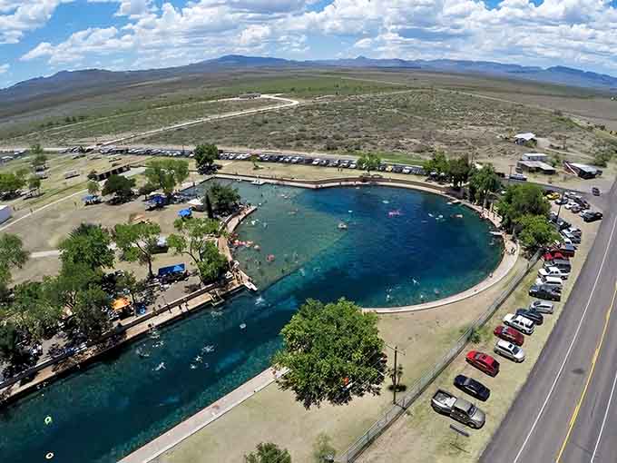From above, this spring-fed oasis looks like someone Photoshopped paradise into the middle of West Texas wilderness.