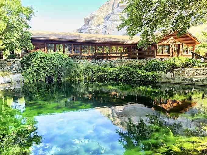 That emerald pool reflecting the sky looks like someone Photoshopped paradise, except it's gloriously, impossibly real.
