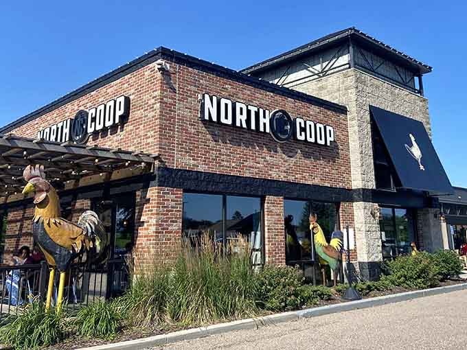 North Coop's cheerful exterior promises Southern comfort in Minnesota, complete with rooster statues that take their job seriously.
