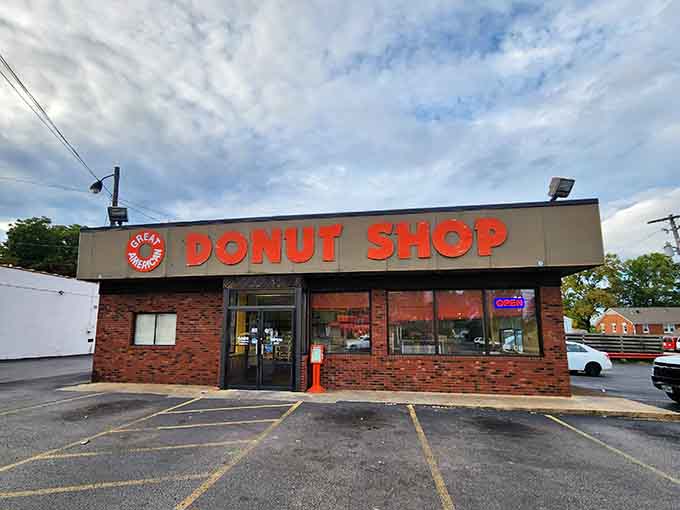 That brick facade and bold red signage are calling your name louder than your alarm clock ever could.