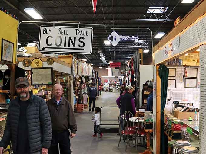 Wide aisles packed with vendor booths stretch endlessly, inviting you to explore everything from coins to collectibles under one roof.