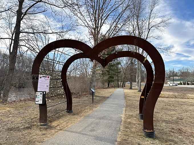 Nothing says "welcome to your next favorite walk" quite like a heart-shaped sculpture inviting you down the trail.