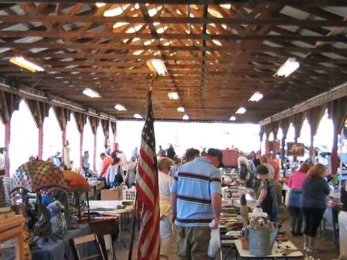 Under this covered pavilion, treasure hunters gather like it's the world's most civilized archaeological dig with better lighting.