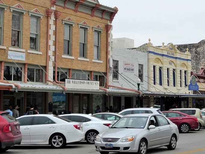 Victorian storefronts line the square like a perfectly preserved postcard, proving some things really do improve with age.