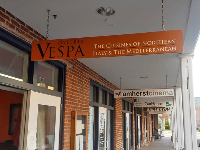 The exposed brick and welcoming signage promise the kind of meal that makes you forget about your diet.
