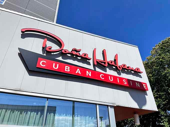 That bold red signage against blue sky promises Cuban flavors worth crossing town for, no passport required.