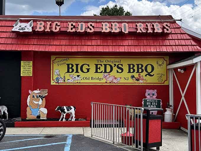 That bright red barn exterior isn't just for show—it's a beacon calling carnivores home to barbecue bliss.