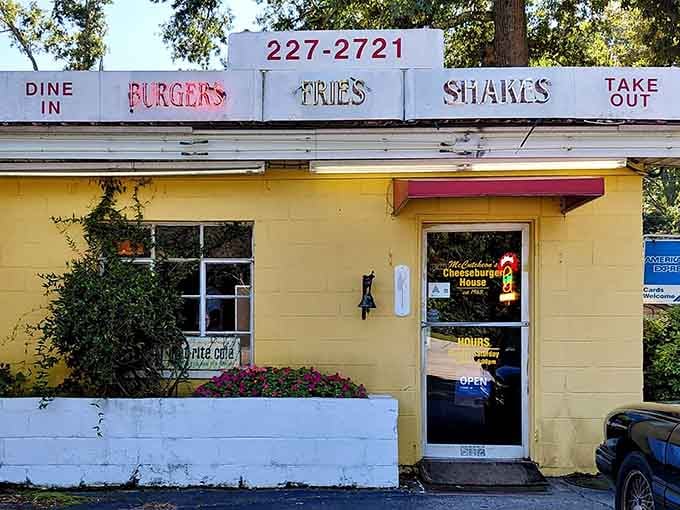 That cheerful yellow exterior isn't just paint, it's a beacon calling burger lovers from miles around.
