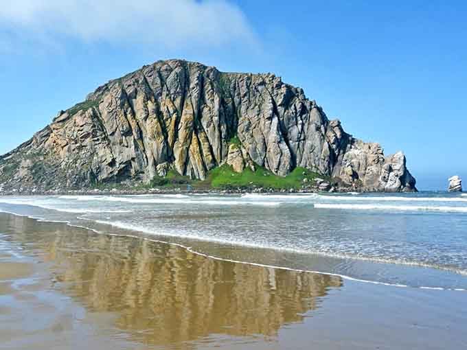 That perfect mirror reflection makes Morro Rock look twice as magnificent, like nature showing off its best work.