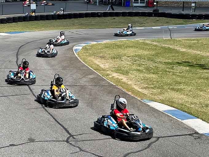 Watch racers navigate the technical corners where precision meets speed on this professionally designed karting circuit.
