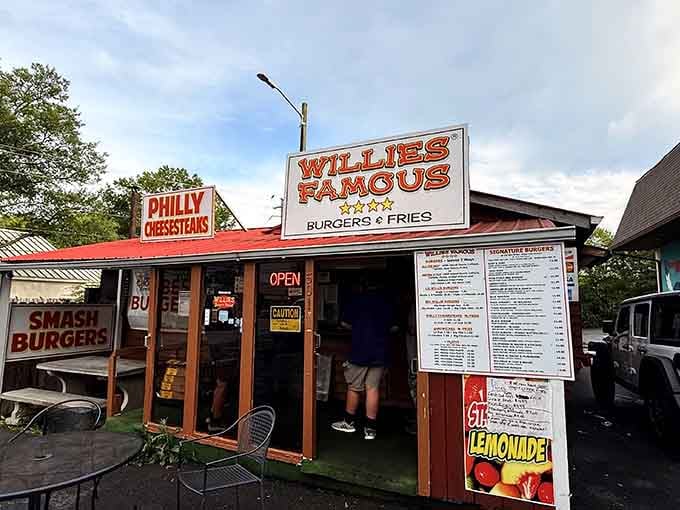 The red roof and simple structure hide culinary magic that'll make you question every burger choice you've ever made.