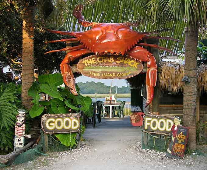 That giant crab entrance isn't just whimsical decor; it's a delicious promise of what awaits inside those weathered walls.