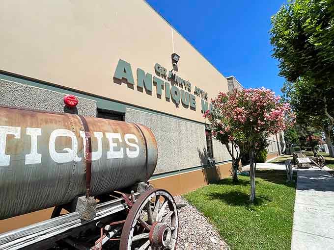 That vintage water wagon outside isn't just decoration, it's your first clue you've found treasure central.