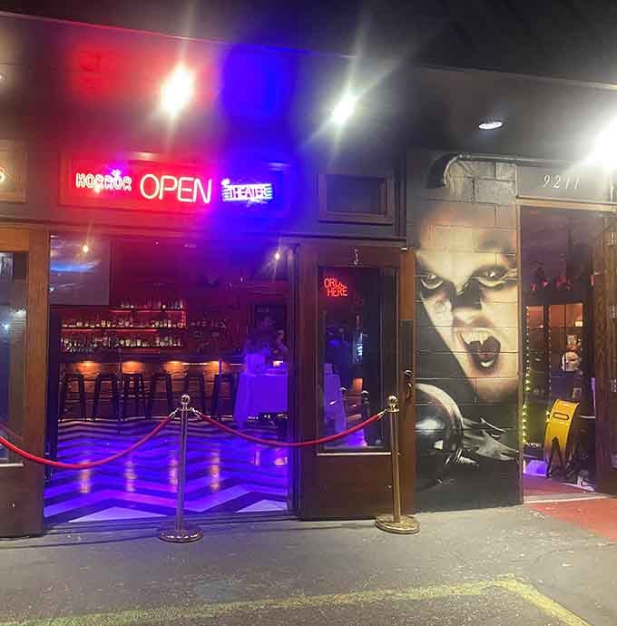 Horror movie murals and a red carpet entrance, because every night out deserves a little drama.