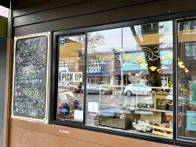 The storefront beckons like a siren song, promising buttery treasures that'll derail your diet before noon.