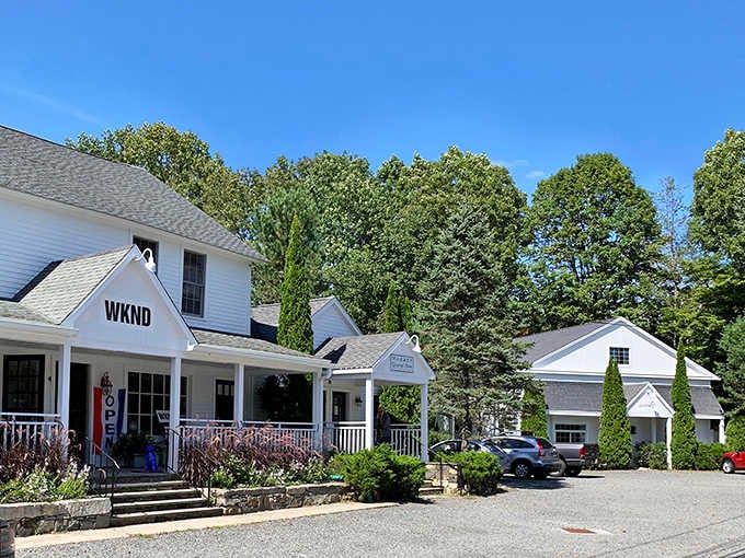 That classic white clapboard exterior isn't just for show; it's your first hint that something special awaits inside.