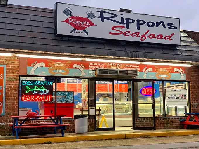 That neon "OPEN" sign glows like a beacon calling seafood lovers home to crab-filled paradise and glory.
