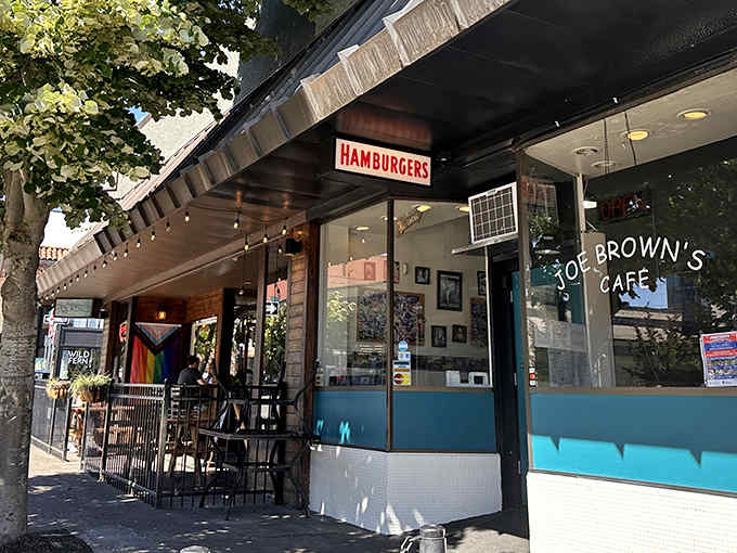 The outdoor seating under string lights turns your morning eggs into a sidewalk cafe experience, minus the accordion player and beret.