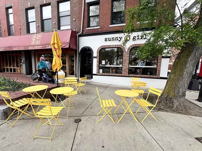 Those yellow chairs aren't just furniture—they're a promise that good things are about to happen to your taste buds.