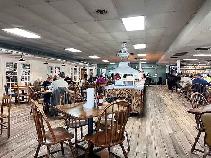 Wood-style flooring and comfortable seating create that welcoming vibe where elastic waistbands are considered formal wear.