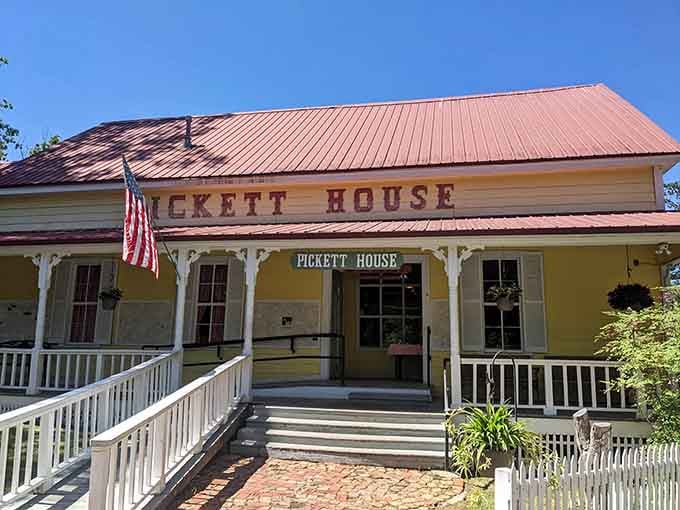 The white picket fence and front porch practically whisper "come sit a spell and eat some chicken."