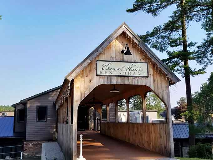 That covered bridge entrance isn't just charming, it's your gateway to waterfront dining done absolutely right.