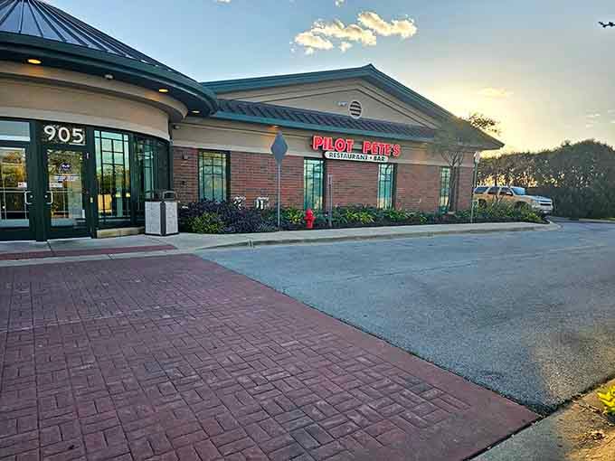 The unassuming exterior hides an aviation wonderland inside, proving that the best adventures often start in suburban strip malls.