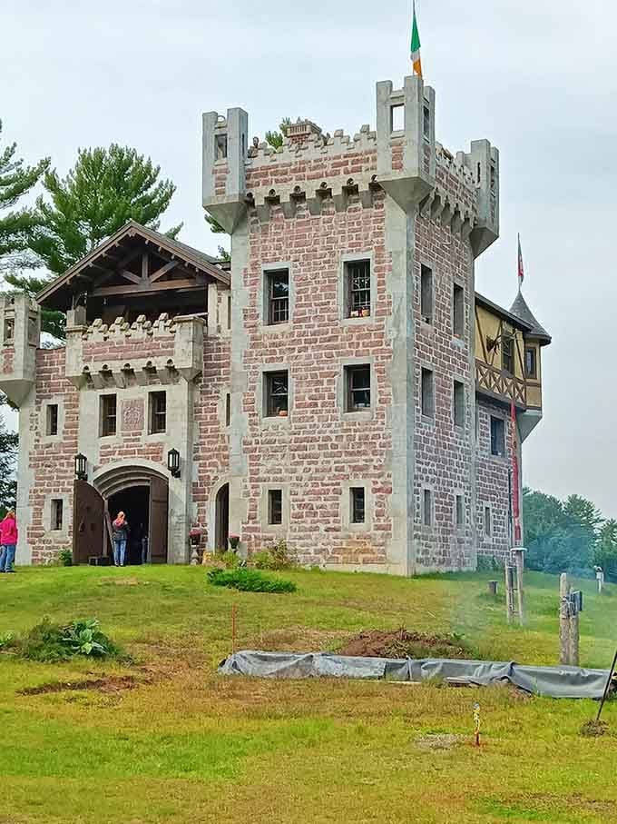 Those crenellated battlements and pink stone towers rising from Wisconsin soil prove dreams don't need passports to come true.