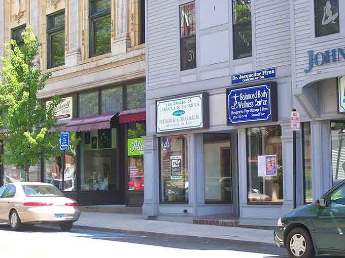 Downtown storefronts where local businesses thrive and parking doesn't require a trust fund or divine intervention.