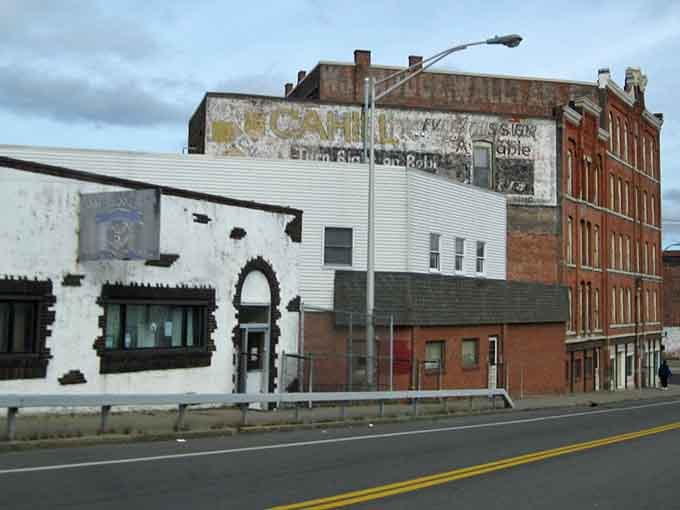 Those faded ghost signs whisper stories from when downtown Binghamton was the place to be.