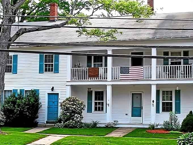 That front porch with the flag practically begs you to sit with lemonade and wave at neighbors.