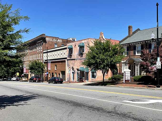 Downtown Danville's historic brick buildings stand proud under blue skies, reminding you that real architecture has actual character.